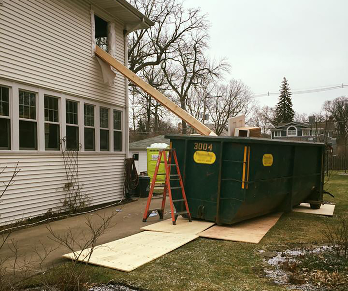 Garbage chute from second floor to dumpster