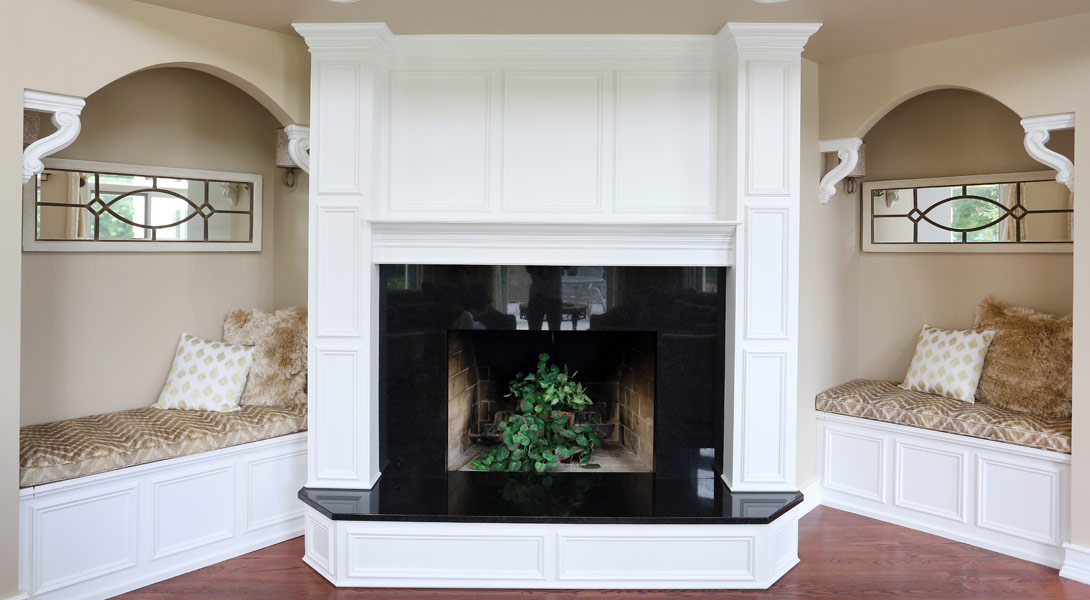 Fireplace with a pair of reading nooks : Normandy Remodeling