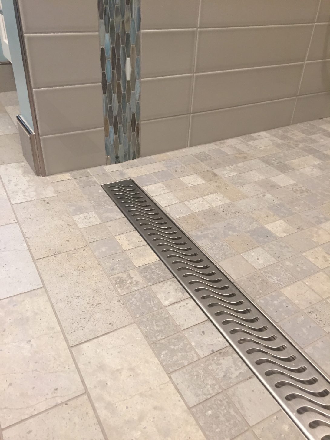 Modern bathrooms are all about clean, sleek lines. One way to ...