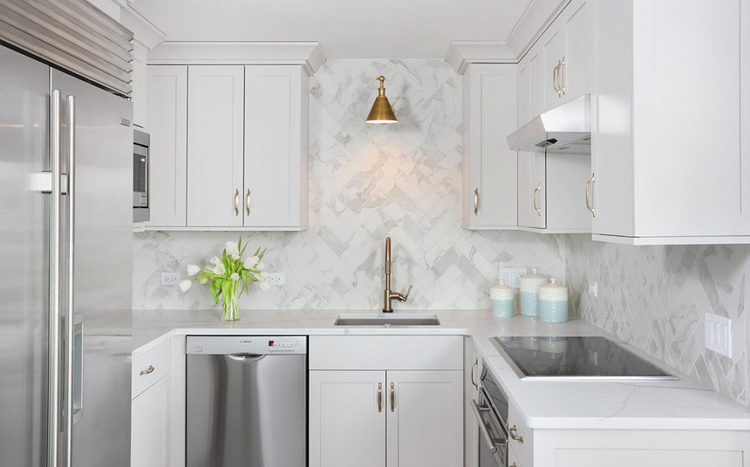 Herringbone tile isn’t just for the walls – or the kitchen.